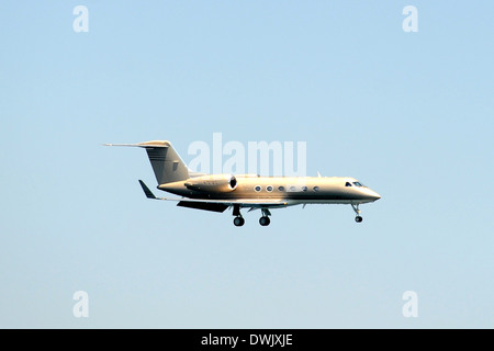 A gold private jet Stock Photo - Alamy