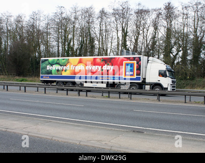 Aldi supermarket supply chain delivery trailer & Volvo truck driving ...