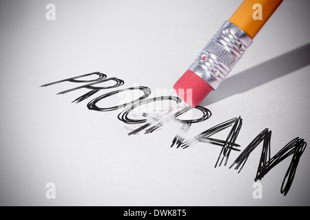 Pencil erasing the word Program Stock Photo - Alamy
