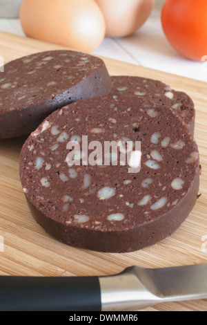 Black pudding a British type of blood sausage containing onions, pork ...