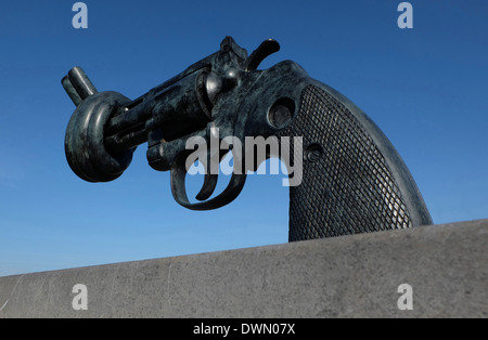Sculpture of a gun with a twisted barrel tied in a knot on the Victoria ...