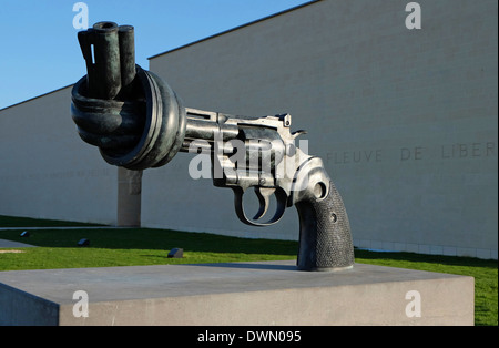 Sculpture of a gun with a twisted barrel tied in a knot on the Victoria ...