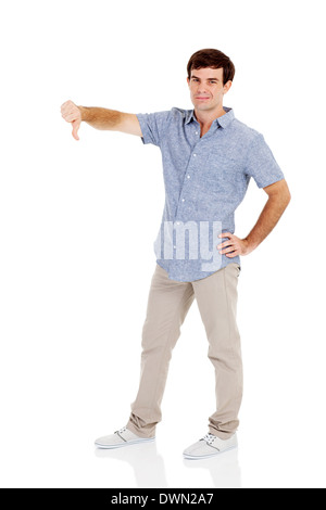 Young man looking frustrated and giving thumbs down at the park Stock ...