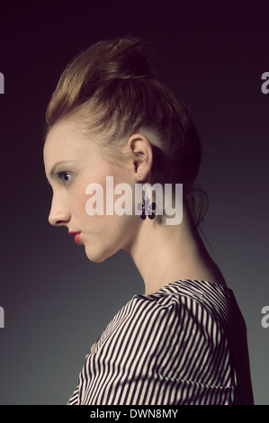 Profile side view portrait of pretty cheerful woman sitting on table ...