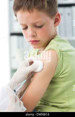 Boy receiving injection,close-up Stock Photo - Alamy