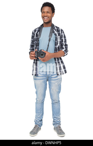 full-length . young man photographer with camera.isolated on white ...