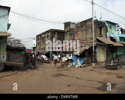 Streets of Kolkata. Poor Indian family living in a makeshift shack by ...
