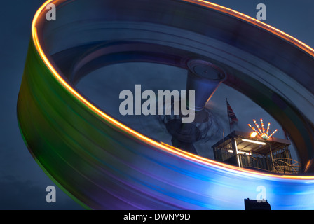 spinning funfair wheel wall of death or round-up standing and ...
