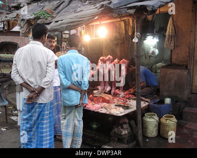 In a street, a butcher is selling he-goat meat ( Pakistan Stock Photo ...