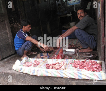 In a street, a butcher is selling he-goat meat ( Pakistan Stock Photo ...