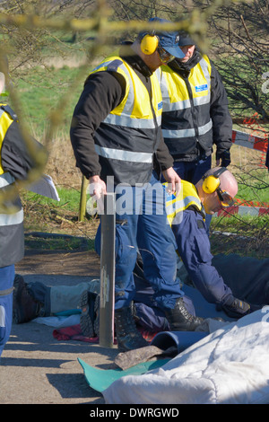 Protester Removal Team ( Police ) in the process of removing a 'lock-on ...