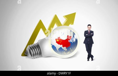 Businessman inside light bulb Stock Photo - Alamy