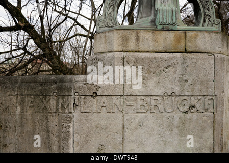The Maximilian bridge in Munich, Germany is adorned with the statue of ...