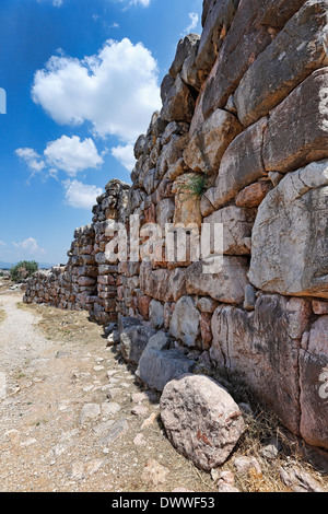 The cyclopean walls of the Mycenaean citadel of Tiryns situated between ...
