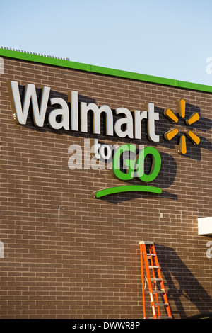 The sign on the outside of the new Walmart To Go concept convenience ...