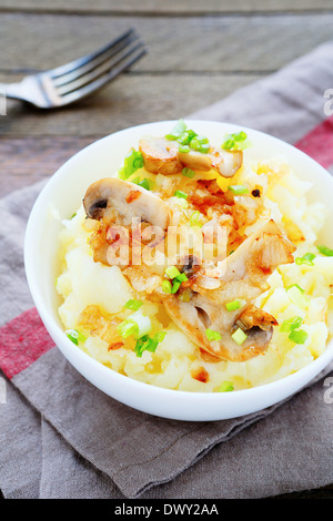 Bowl with tasty mashed potatoes and mushrooms on white background Stock ...