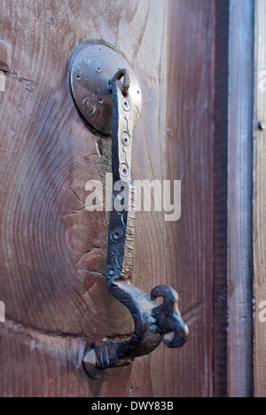 Old ornamental knocker hammer Stock Photo - Alamy