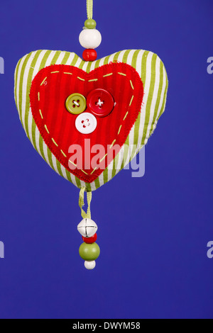 Heart lining on blue background Stock Photo - Alamy