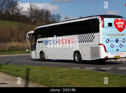 National Express coach side and back view driving on M25 motorway Essex ...