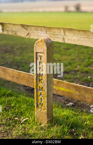 Concrete water main marker post showing pipe diameter size and distance ...