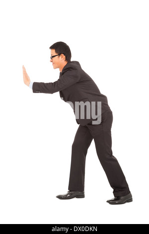 Asian business man push something Stock Photo - Alamy