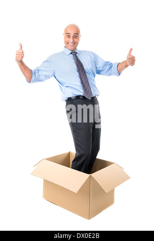 Warehouse worker hold the carton box walk along the steel racking shelf ...