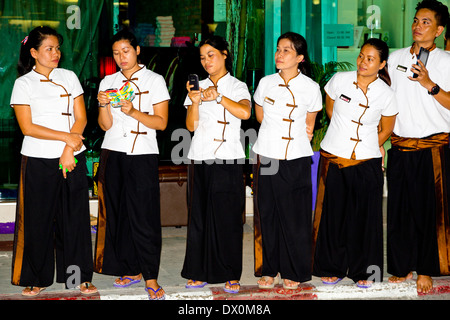 Massage Girls watching a Parade in Patong, Phuket, Thailand Stock Photo - Alamy