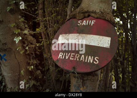 Sauf Riverains road sign Stock Photo - Alamy