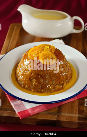Steamed orange marmalade pudding. Traditional dessert UK Stock Photo ...