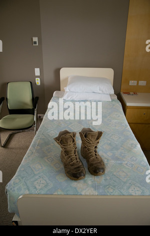 Army boots in hospital ward Stock Photo - Alamy