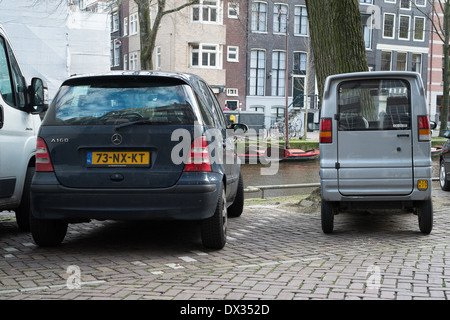 Small electric city car,Amsterdam,Netherlands Stock Photo - Alamy