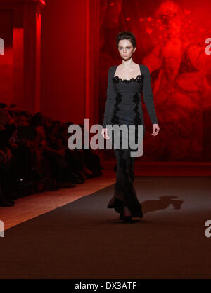 Kiev, Ukraine. 16th Mar, 2014. A model presents a creation by Ukrainian ...