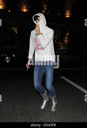 X Factor contestant Rylan Clark hides from the cameras as arrives back ...