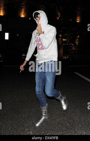 X Factor contestant Rylan Clark hides from the cameras as arrives back ...