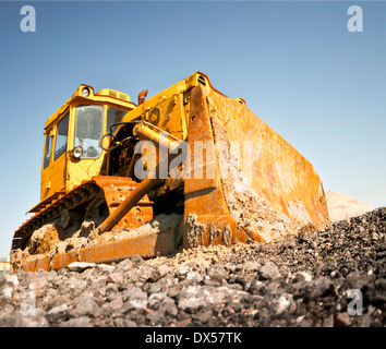 a tractor blade bulldozer dozer rusty iron steel industrial backdrop ...