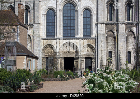West facade with the Royal Portal of the gothic Cathedral of Notre Dame ...