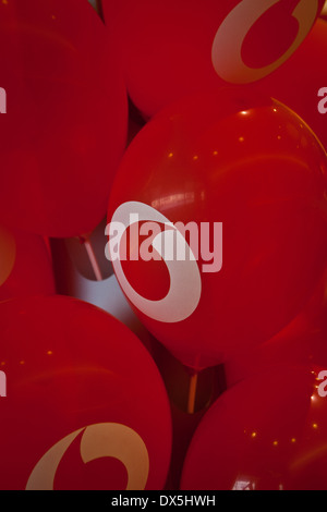 The logo of mobile phone network Vodafone is displayed on the screen of ...