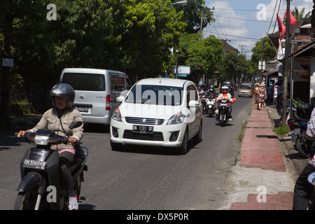 Traffic jam Ubud Indonesia Bali city main street cars congestion people ...