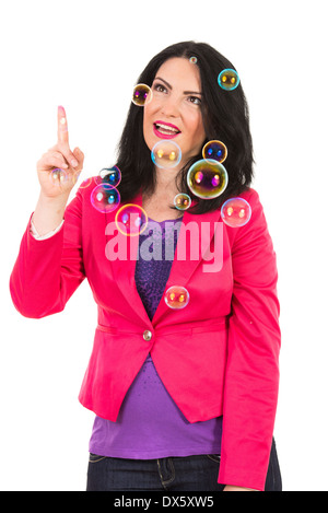 Person touching soap bubbles on a black background Stock Photo - Alamy