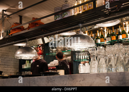 Interior lighting of a bar and restaurant in a Soho street, on 9th ...