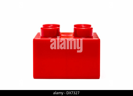 Red building blocks closeup on white background Stock Photo - Alamy