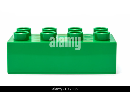 Green building block isolated on white Stock Photo - Alamy
