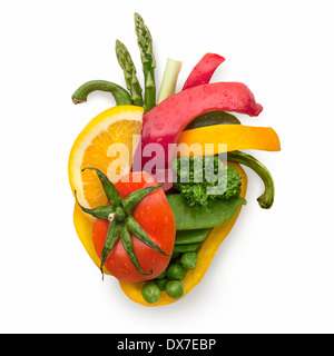 A healthy human heart made of fruits and vegetables as a food concept ...