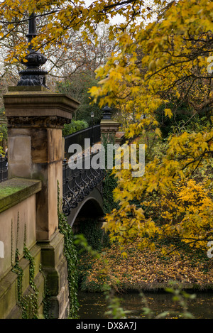Primrose Hill Bridge, Regent's Park, London, shrouded in the golden ...