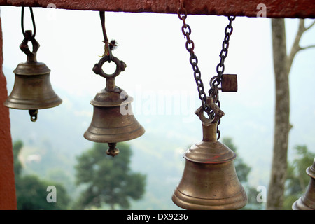 Row of hanging bells from small to large Stock Photo - Alamy