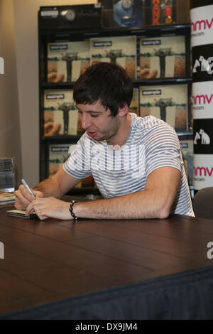 Example signs copies of his new album 'The Evolution of Man' at HMV ...
