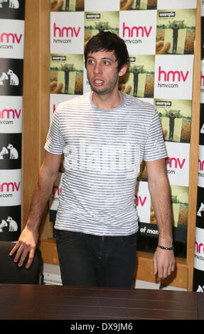 Example signs copies of his new album 'The Evolution of Man' at HMV ...