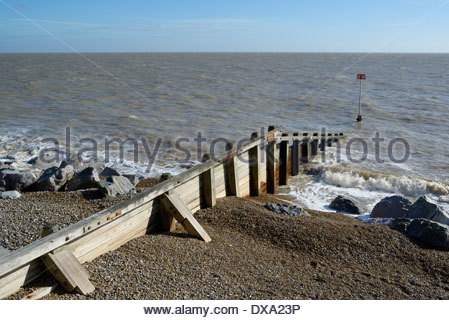 Looking along the sea defences towards The Cobb beach in Lyme Regis ...