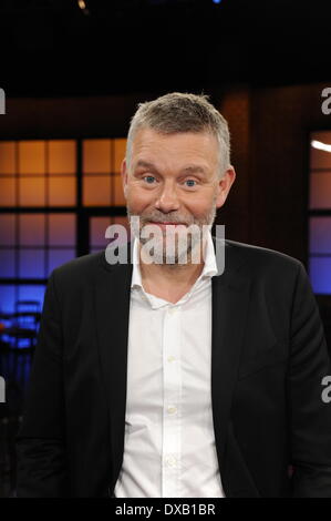 Cologne, Germany. 21st Mar, 2014. Author Szczepan Twardoch sits during ...