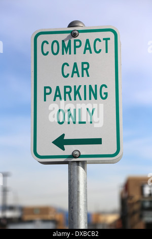Compact car parking only sign Stock Photo - Alamy